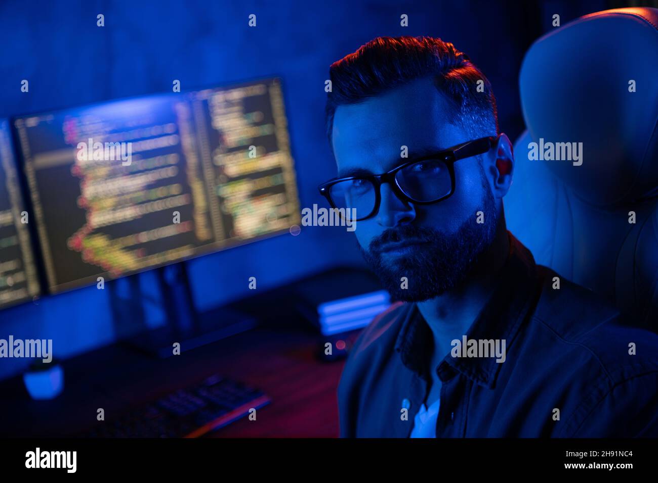 Photo of confident successful operator look camera working midnight ...