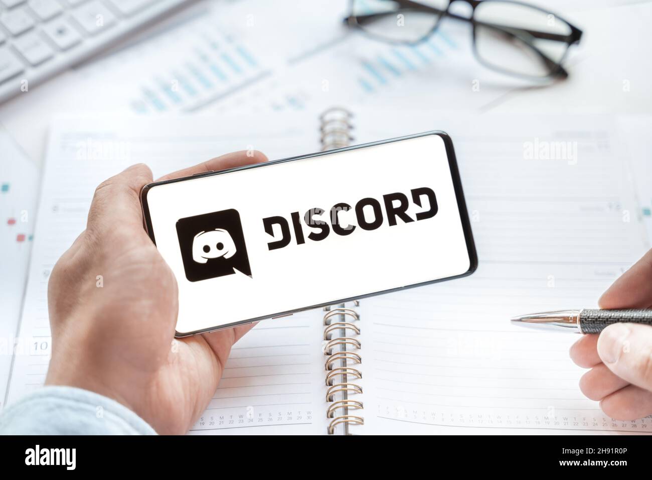 Logo of Discord group chatting application, page in mobile phone ...
