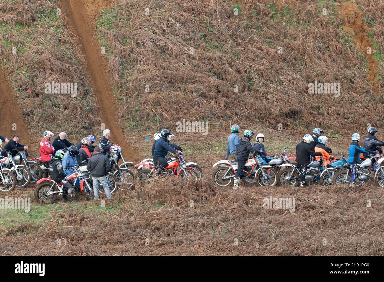 Motorcyclists queue for the next section of a Suffolk motorcycle trial ...