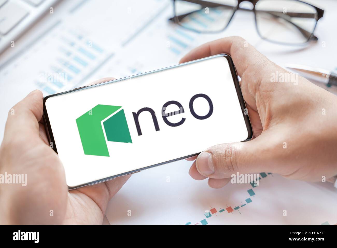 Logo of Neo Smart Economyl in tablet. Cryptocurrency coin token ...