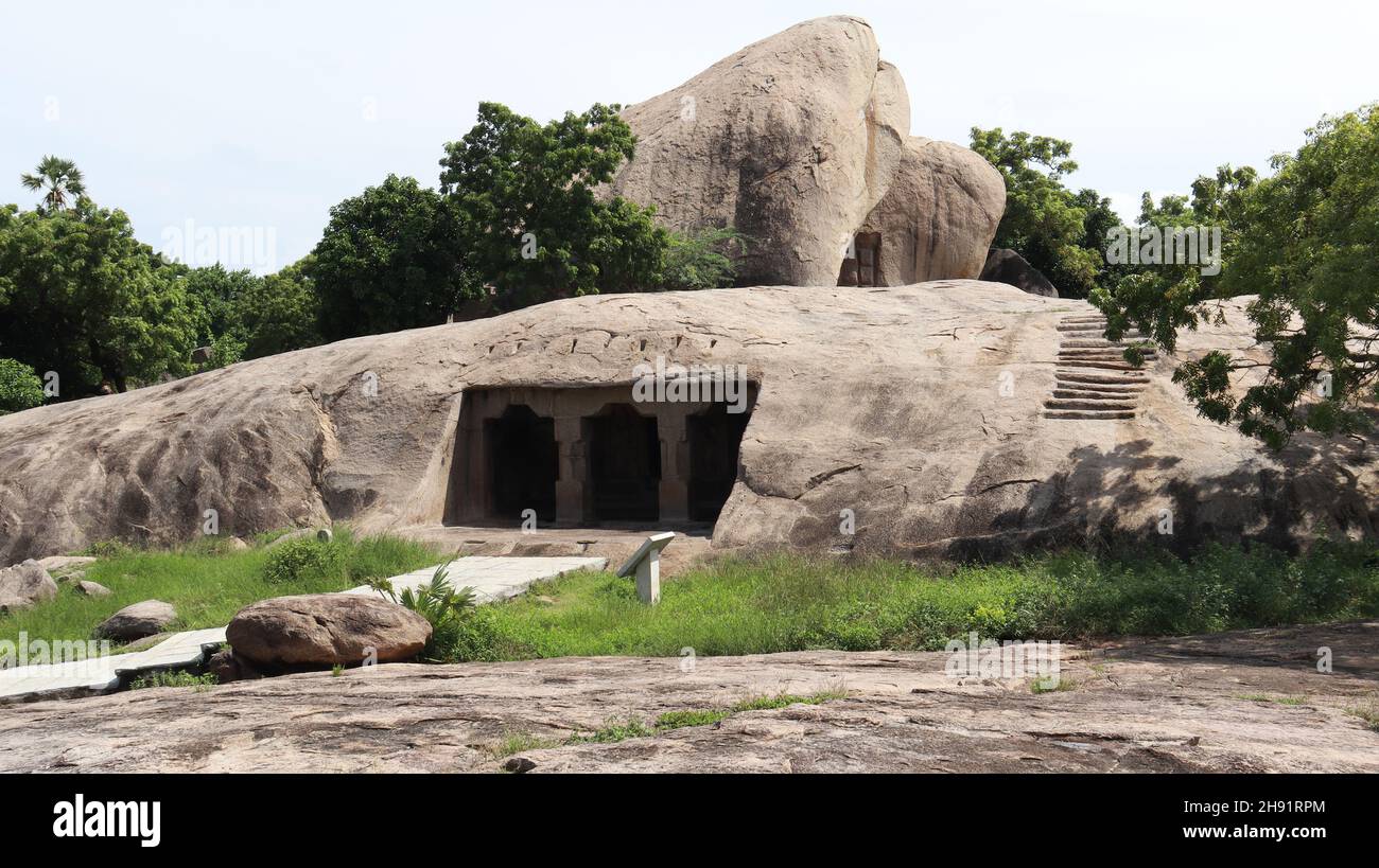 Temple carved in stone on the ground. And there are many sculptures in ...