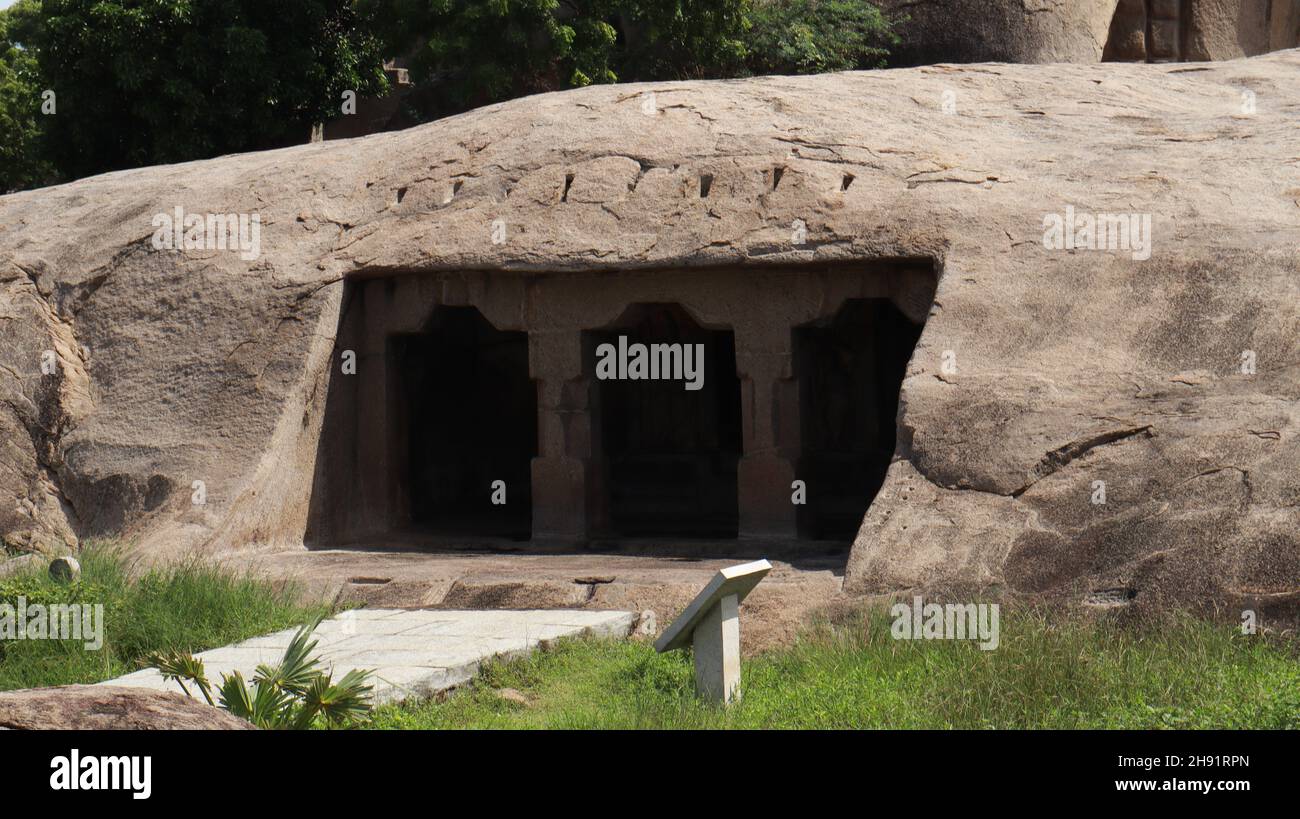 Temple carved in stone on the ground. And there are many sculptures in ...
