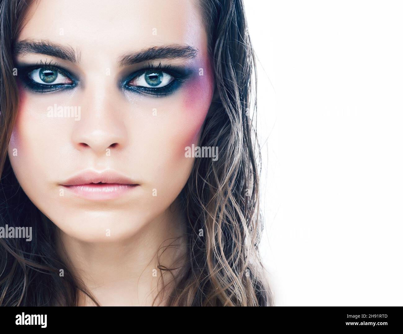 young beauty woman with makeup like shiner on face close up isolated ...
