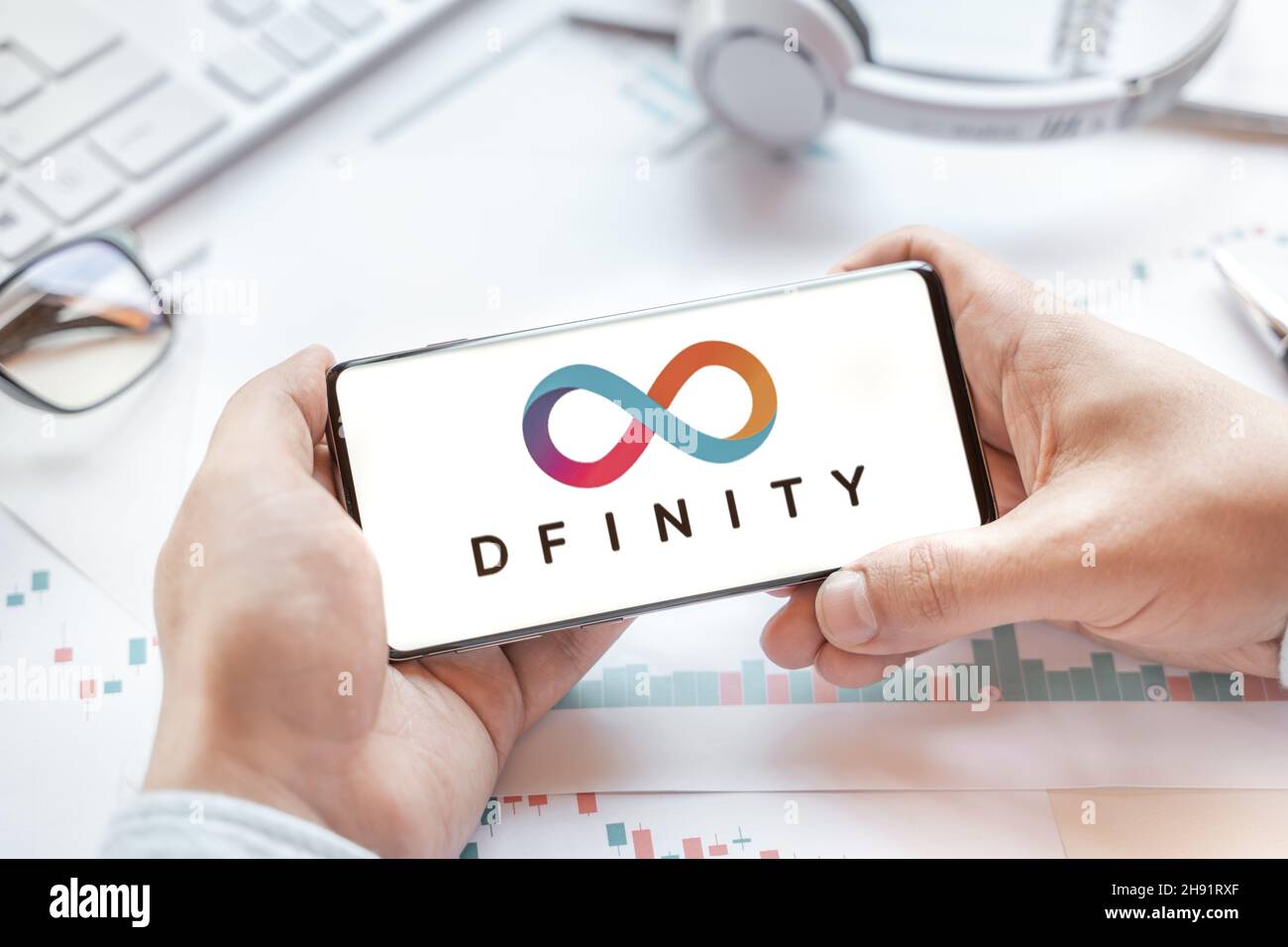Logo of DFINITY Foundation Internet Computer in tablet. Cryptocurrency ...