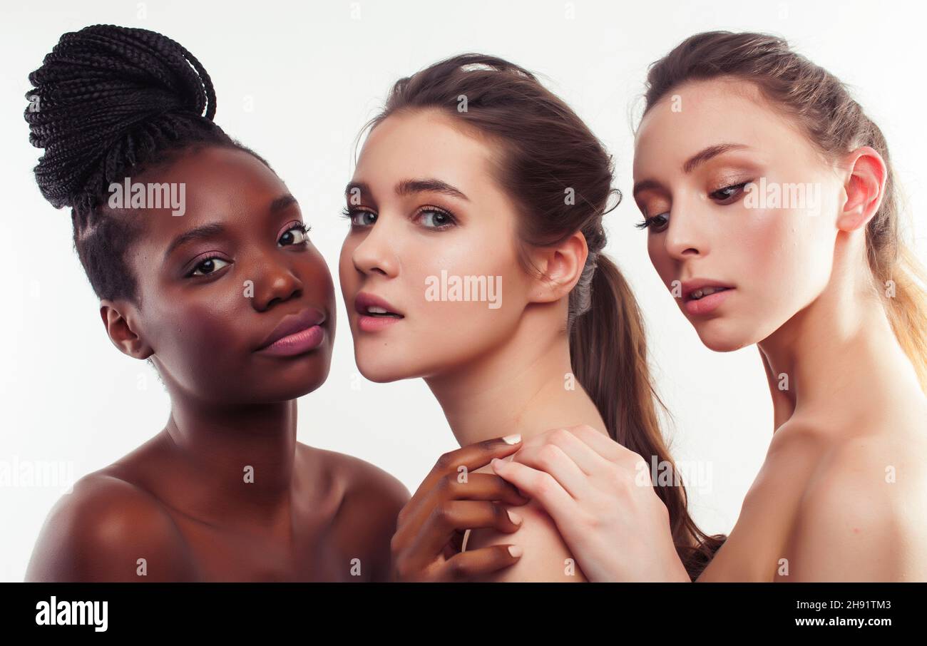three different nation woman: african-american, caucasian together ...