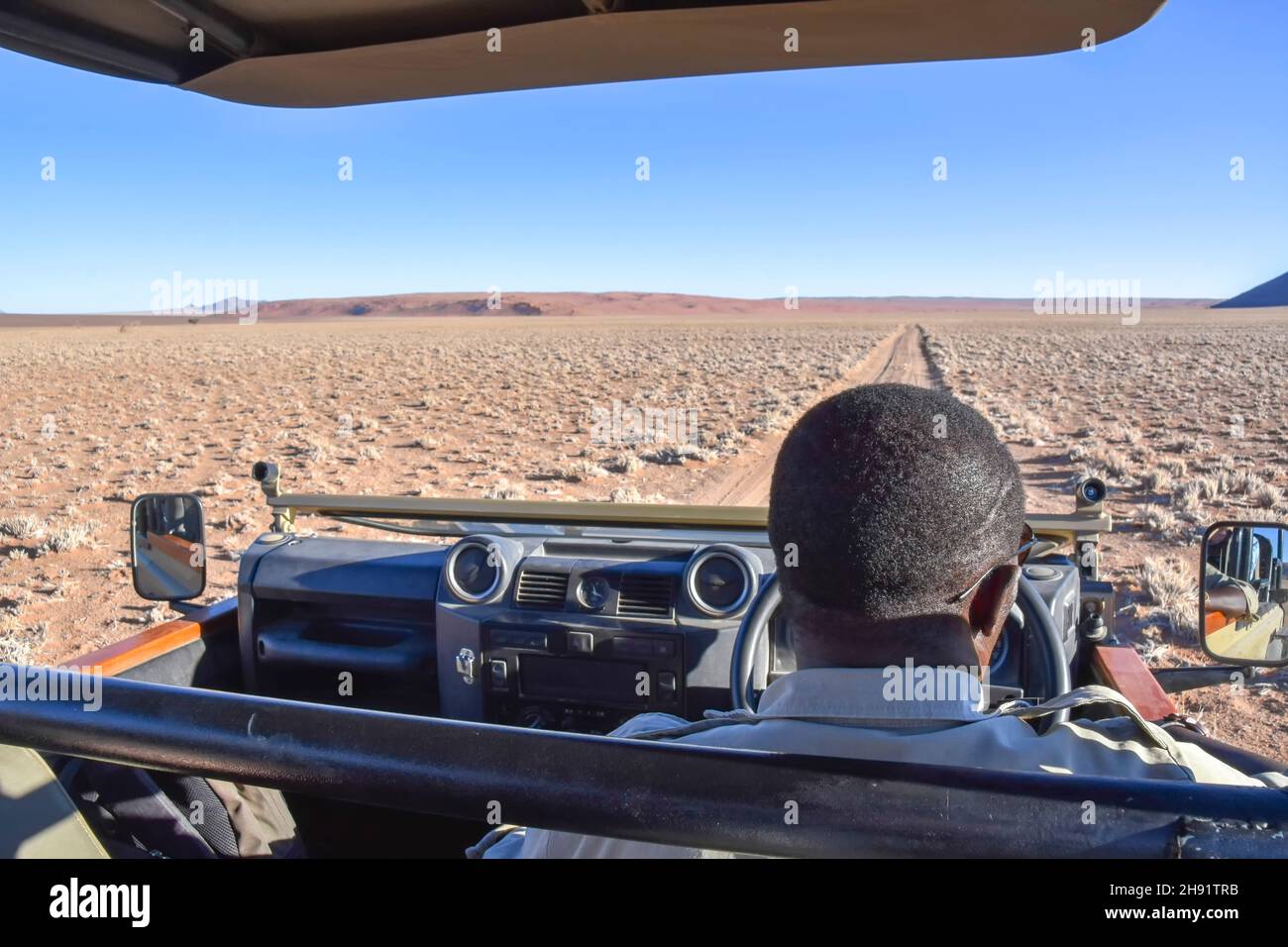 A park ranger looking at the sossusvlei desert in Namibia Southern ...