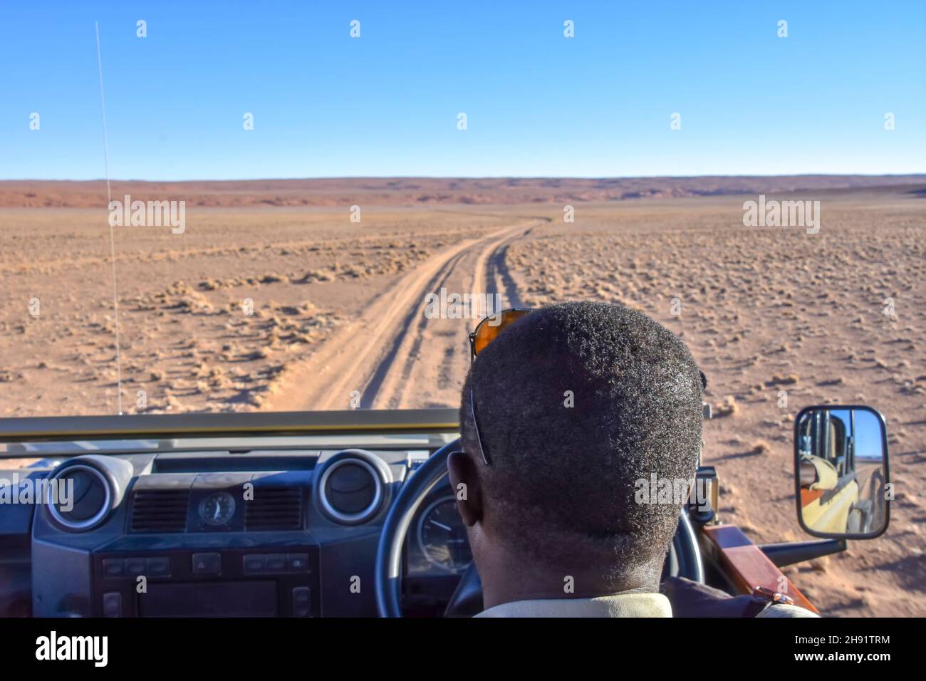 A park ranger looking at the sossusvlei desert in Namibia Southern ...