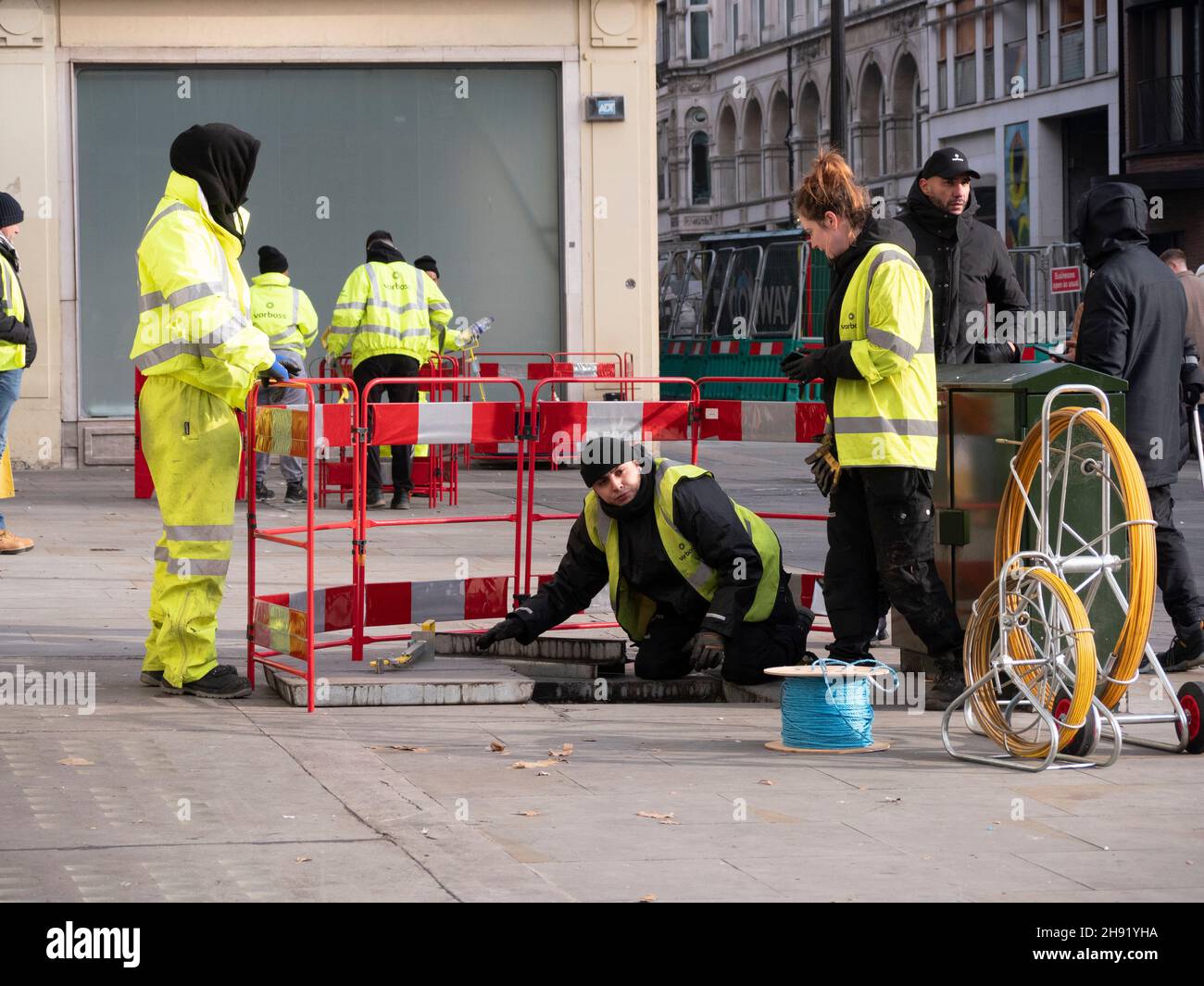 Vorboss engineers fitting cables behind street barriers for Vorboss ...