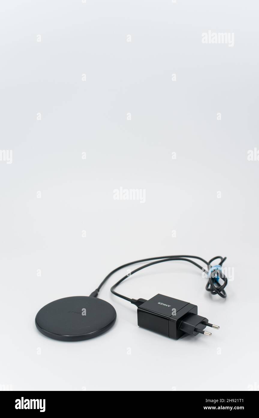 wireless smartphone charger on a white tabletop background Stock Photo ...