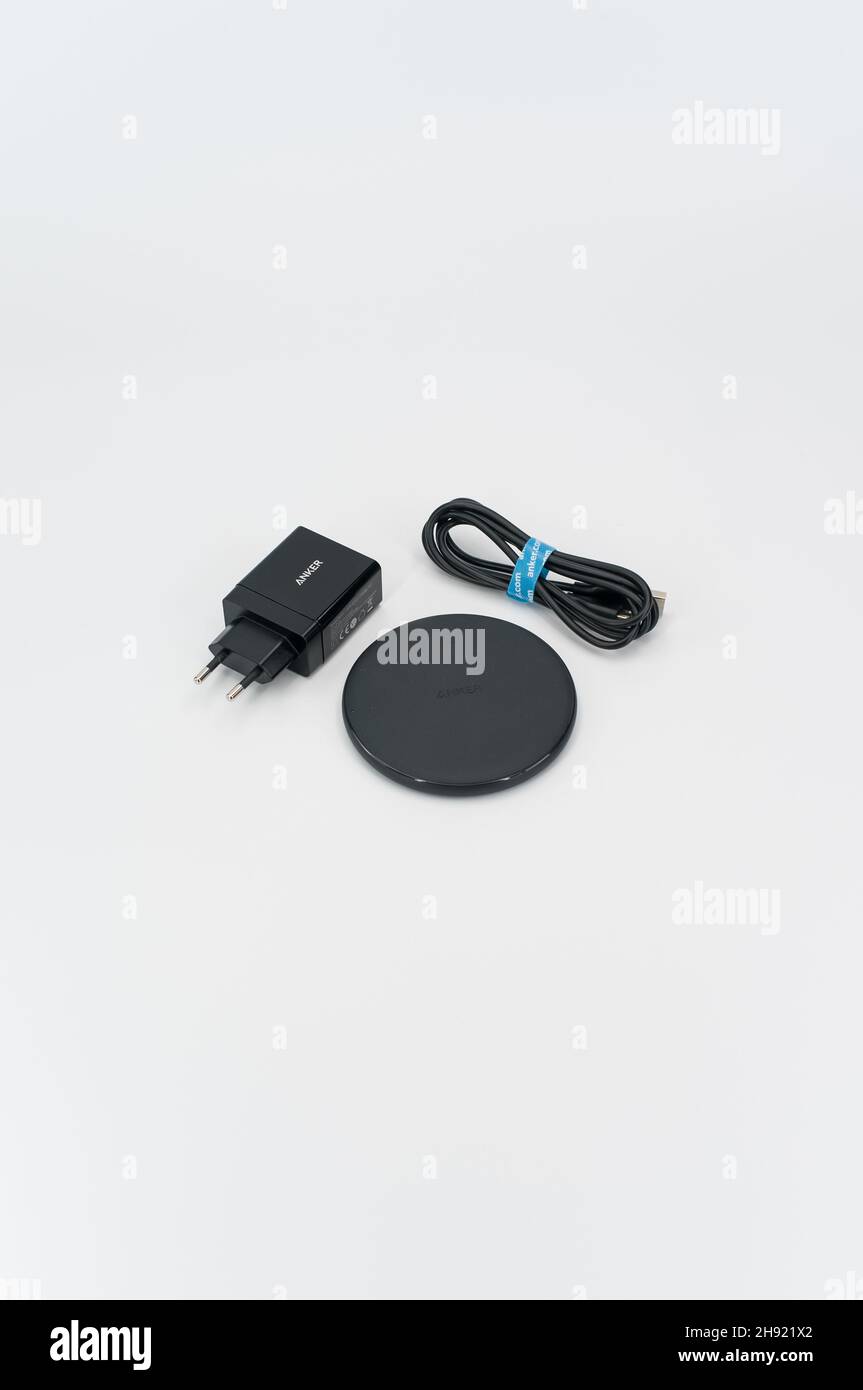 wireless smartphone charger on a white tabletop background Stock Photo ...