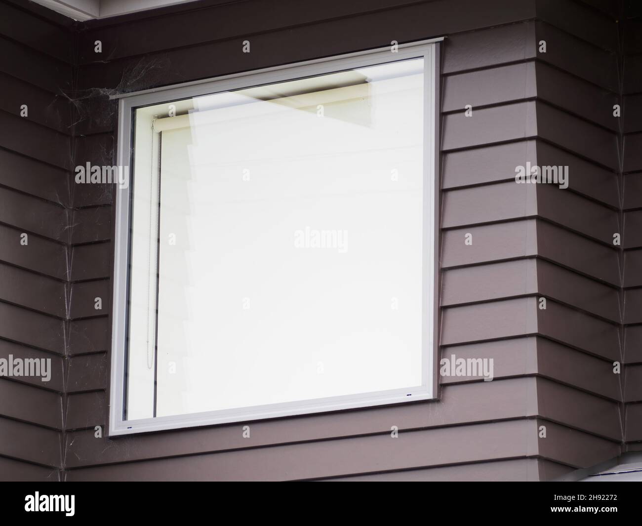 square window on brown wooden weatherboard wall Stock Photo - Alamy