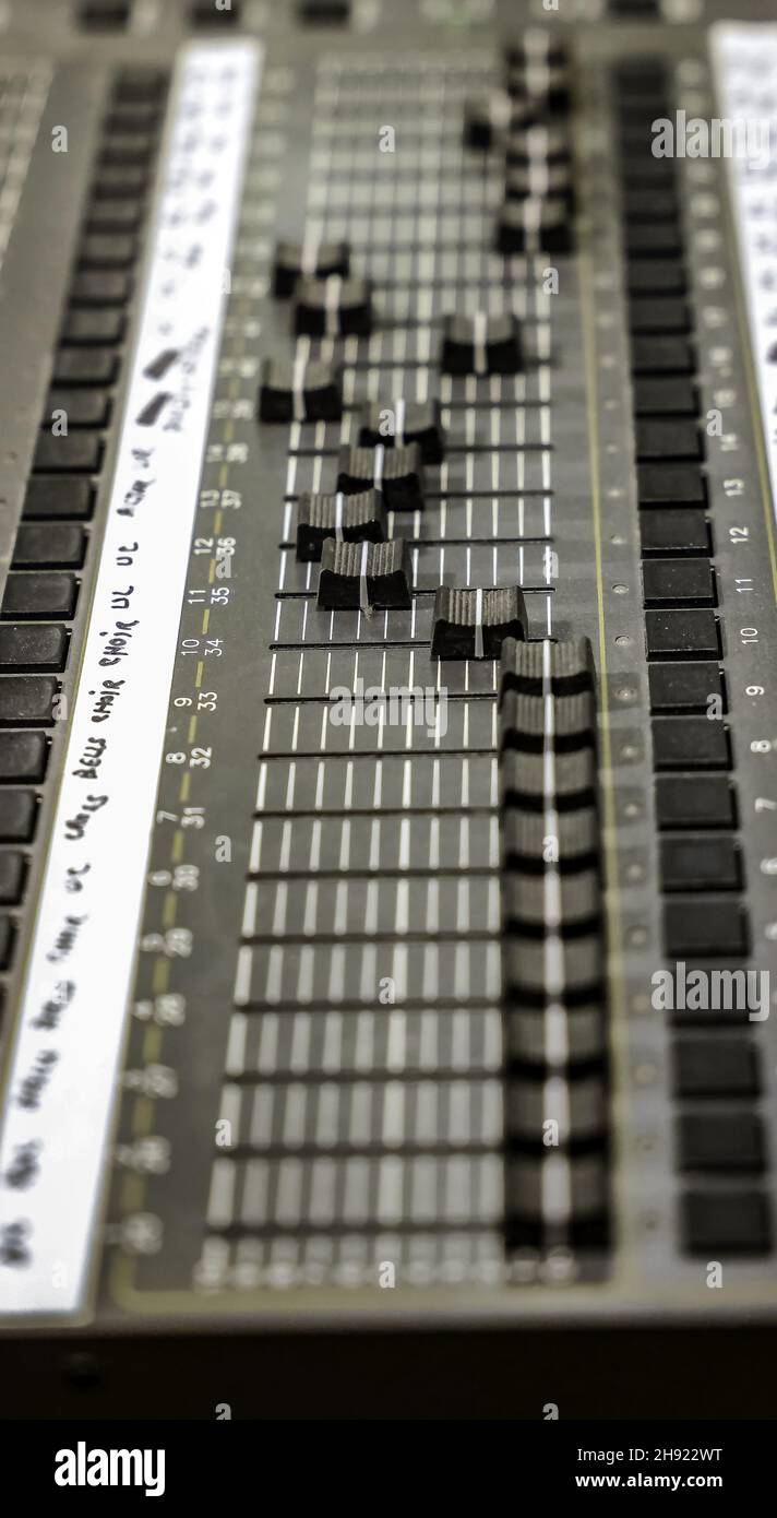 Professional sound and audio mixer control panel with buttons and ...