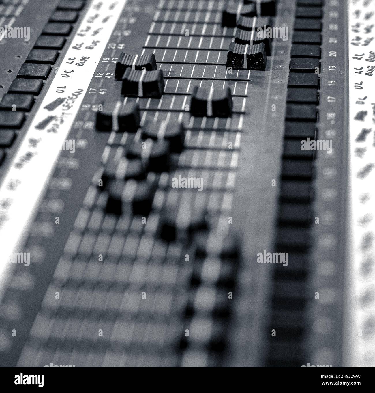 Professional sound and audio mixer control panel with buttons and ...