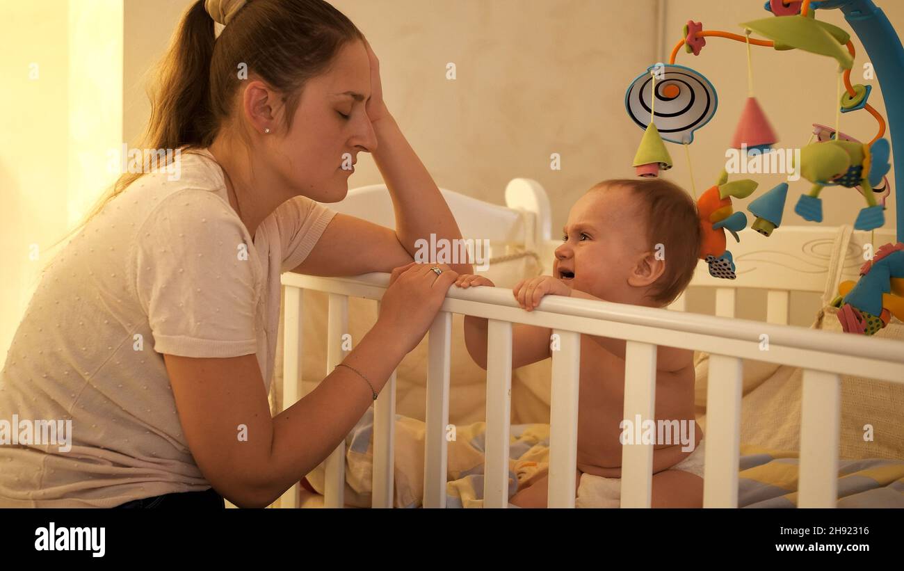 Parent bed rocking hi-res stock photography and images - Alamy