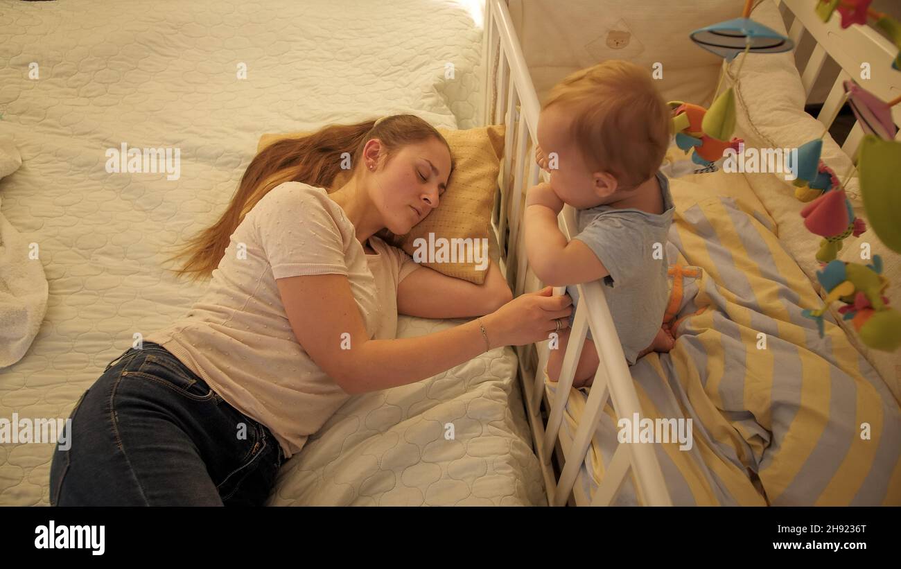Parent bed rocking hi-res stock photography and images - Alamy