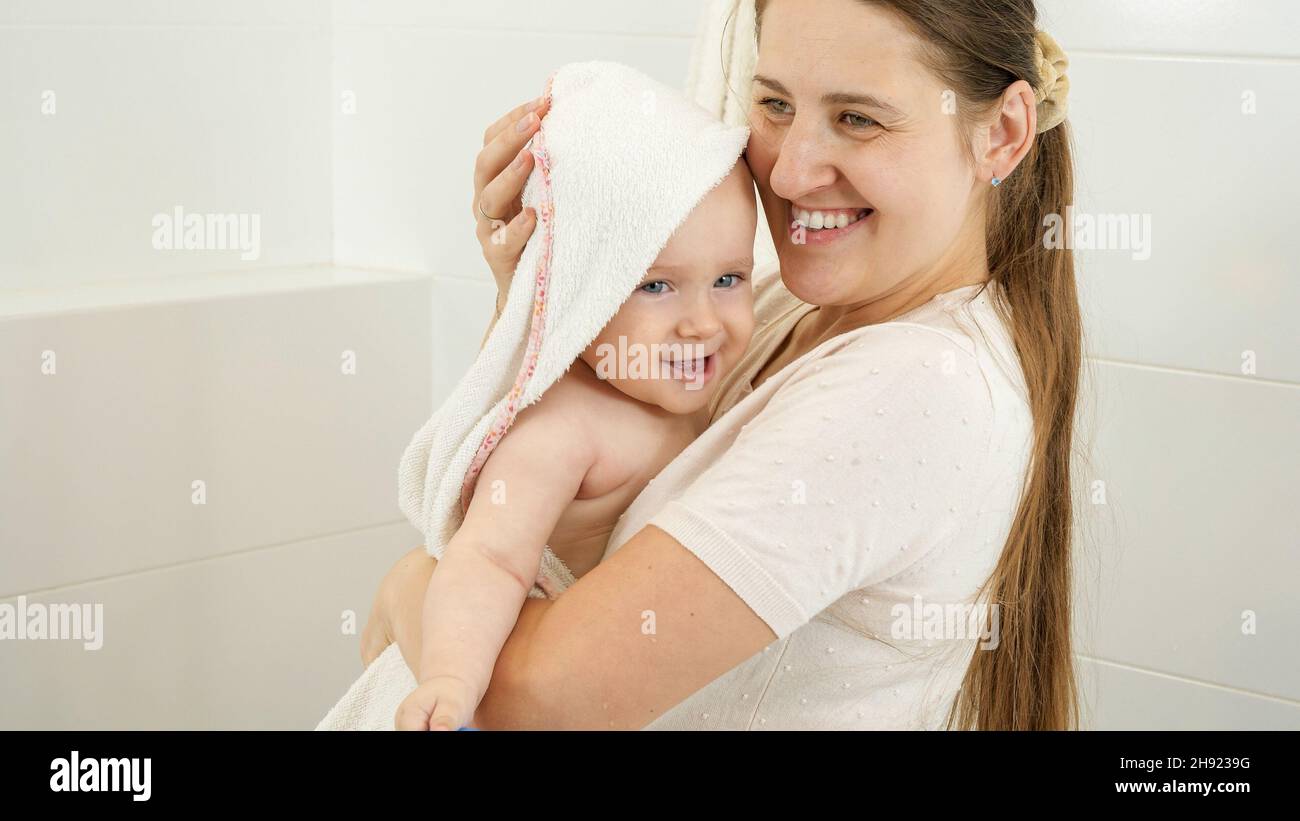 Mother taking shower baby hi-res stock photography and images - Alamy