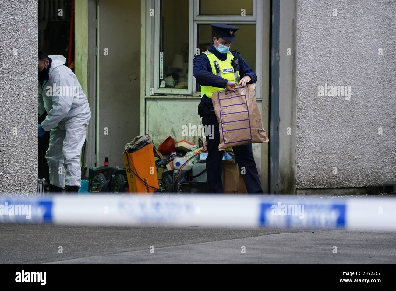 Members of An Garda at the scene of a shooting on Cookstown Road in ...