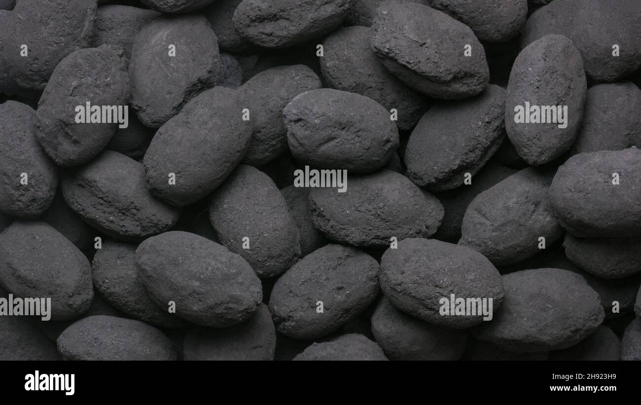 charcoal briquettes for BBQ, background texture, closeup view taken ...