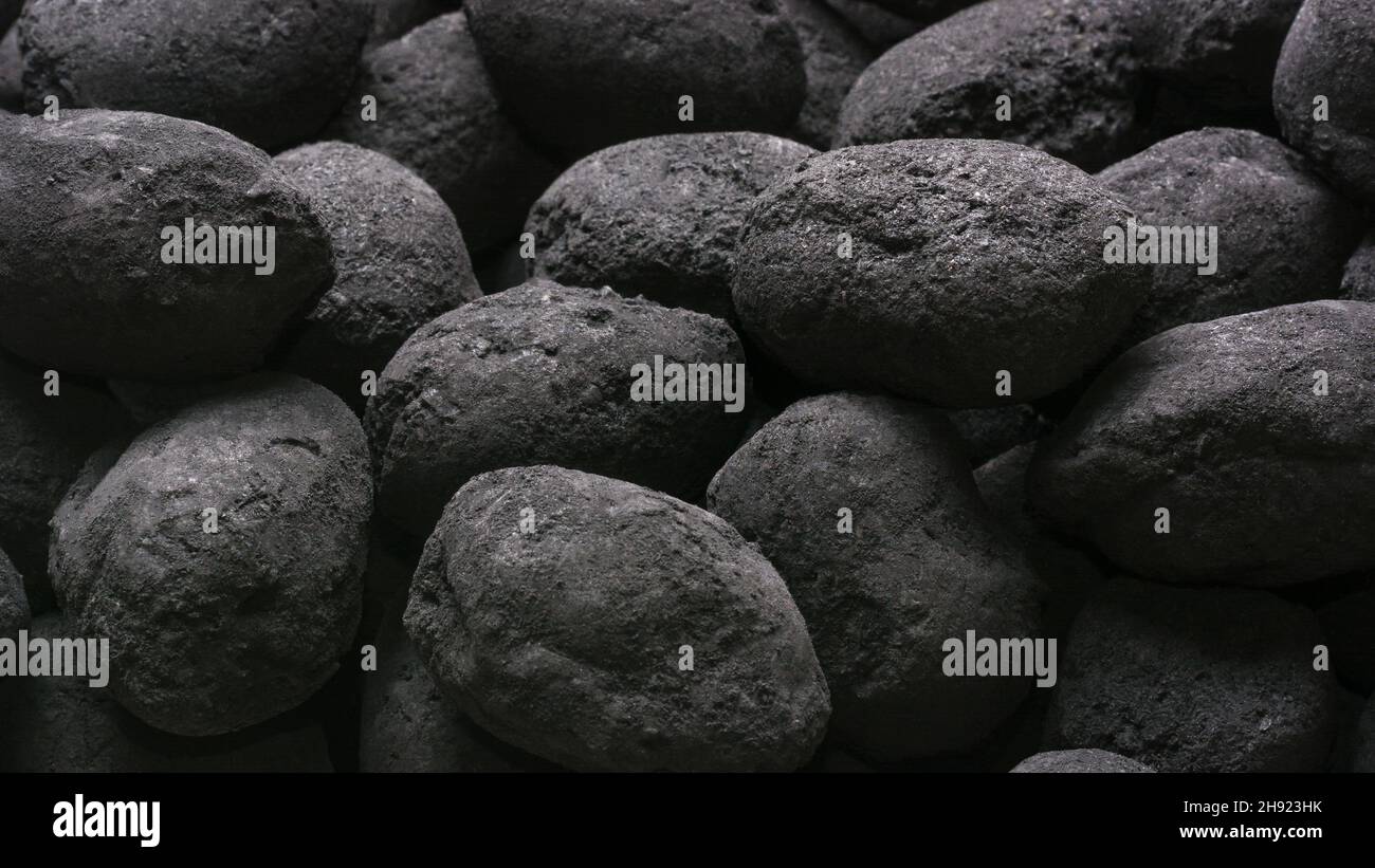 charcoal briquettes for BBQ, background texture, side view closeup in ...