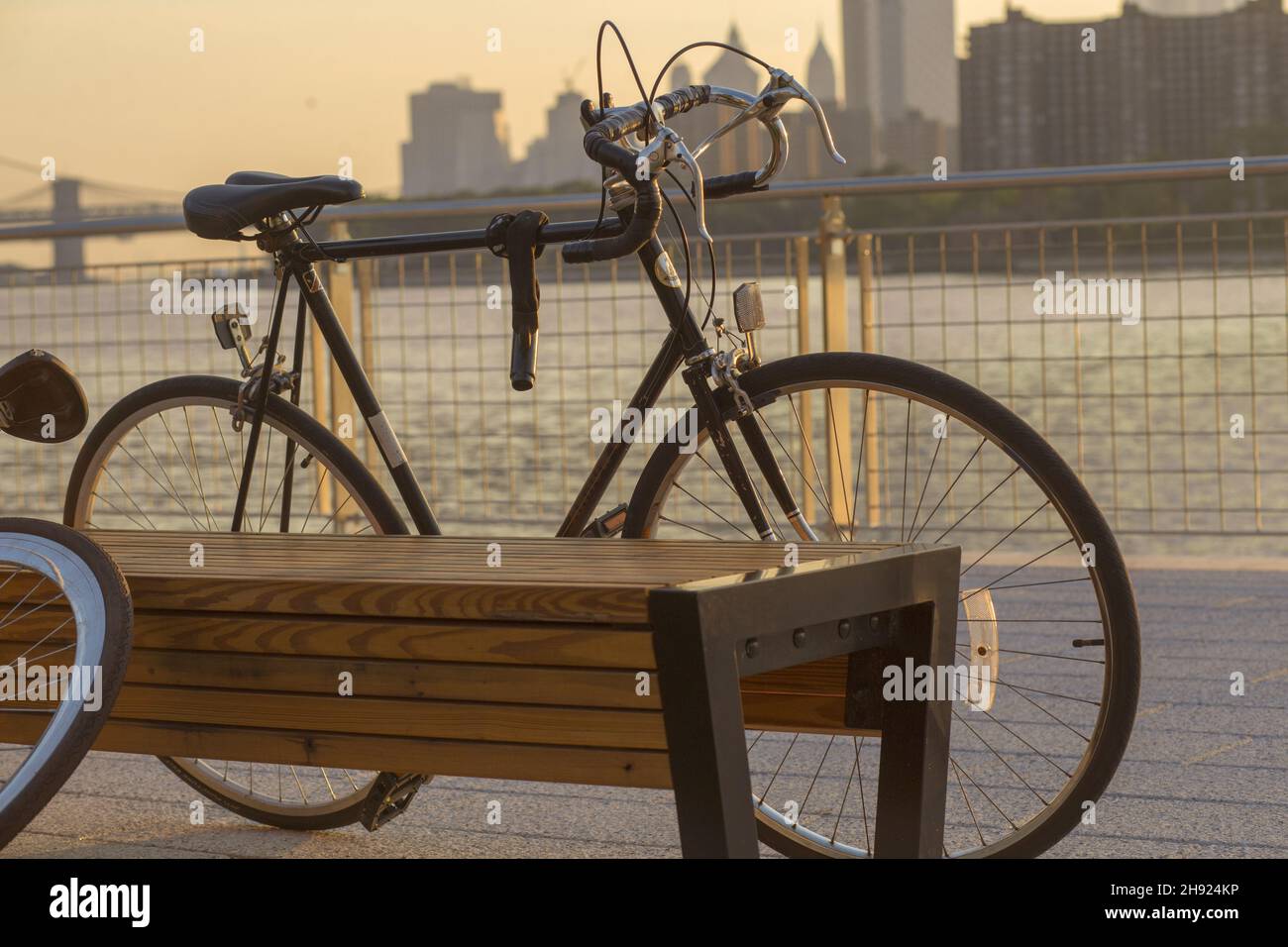 Bicycle leaned on wooden hi-res stock photography and images - Alamy
