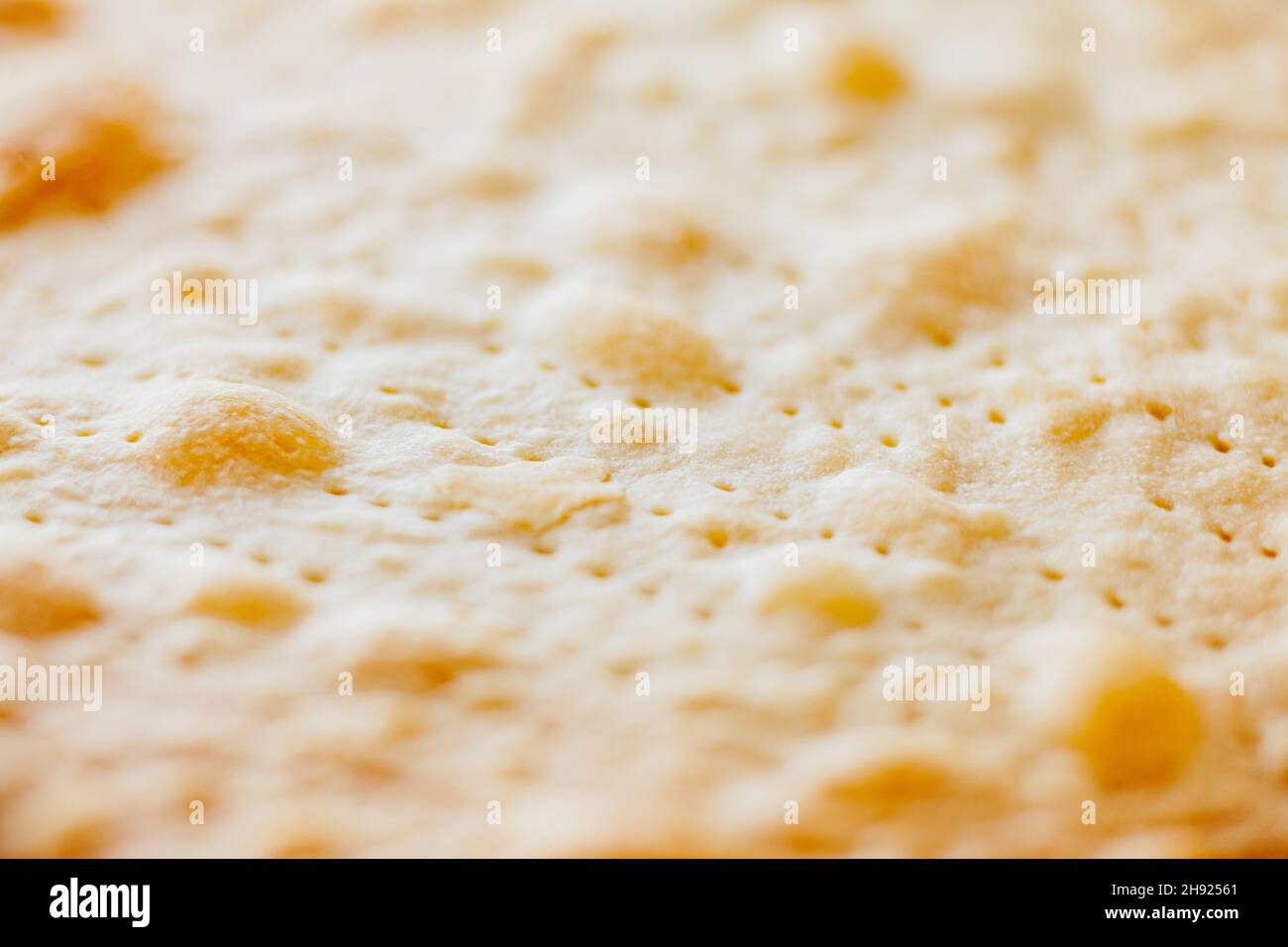 Texture of baked crumpets cakes made of puff pastry for cake. Semi ...