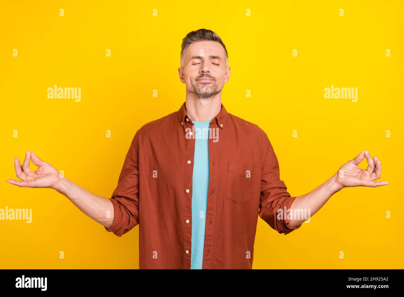 Photo of sleepy mature grey hairdo man do asana wear brown shirt ...