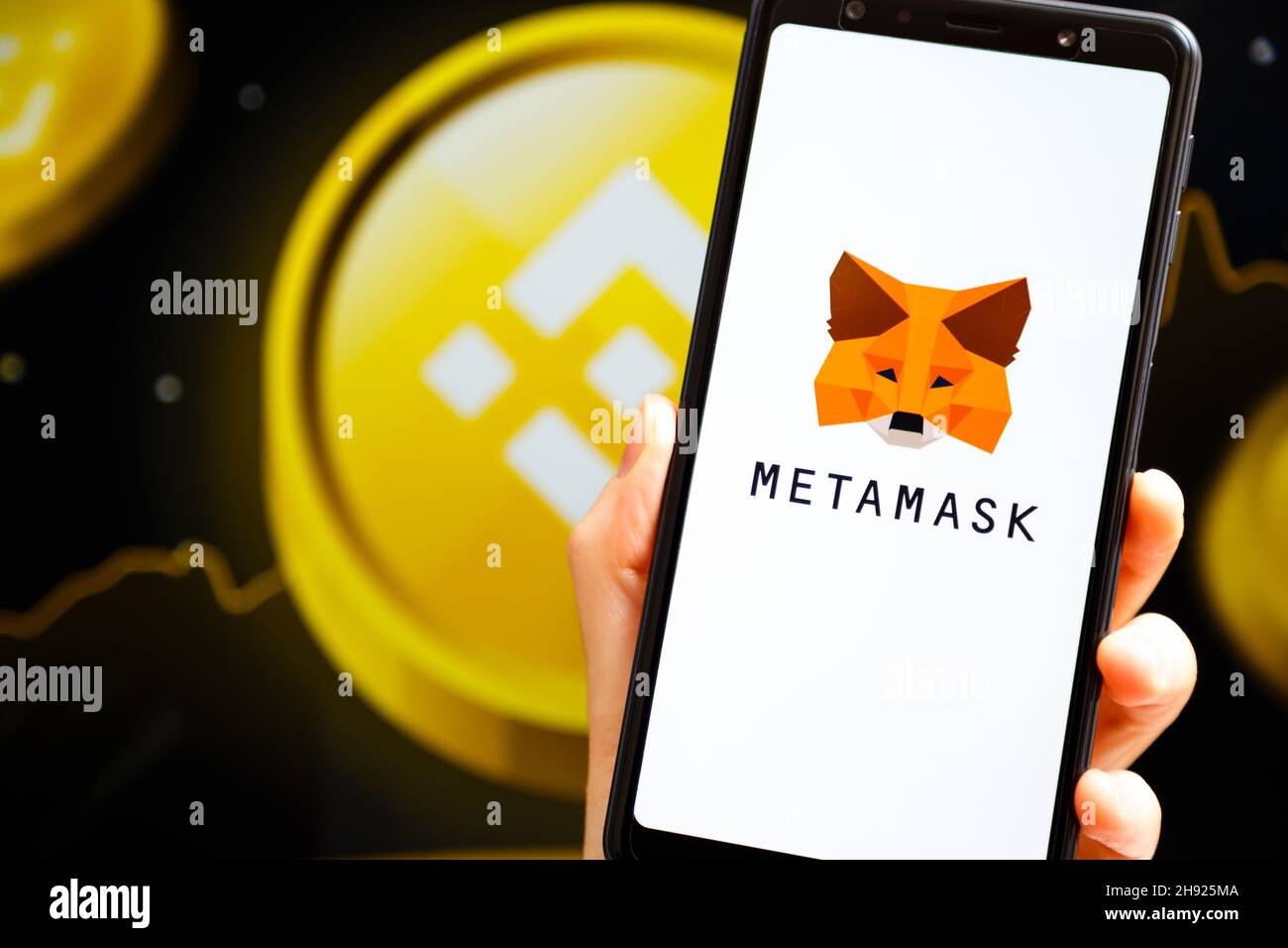 Ukraine, Odessa - October, 9 2021: Hand holding mobile with MetaMask ...