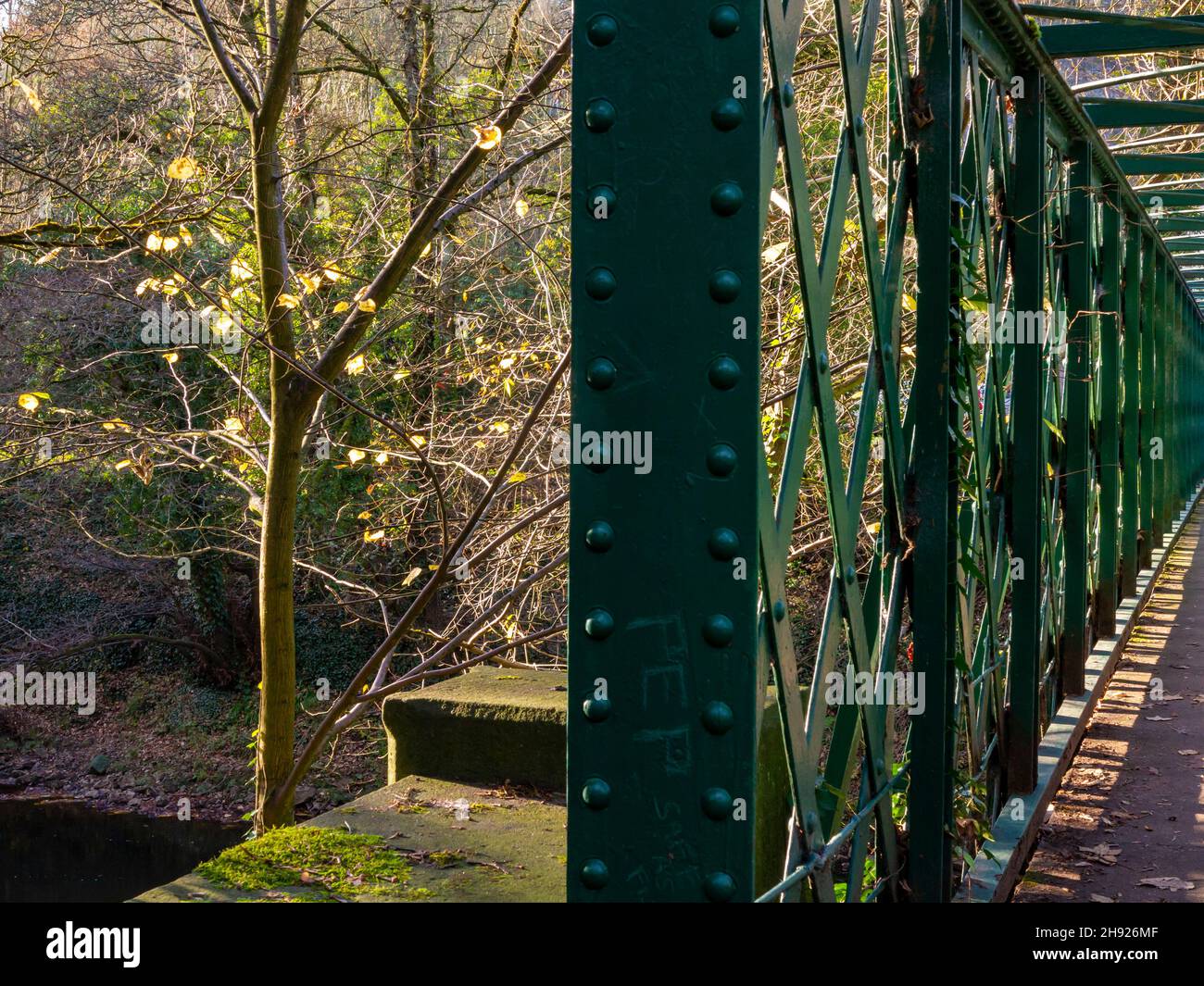 Metal footbridge over the River Derwent near Matlock Bath in the ...