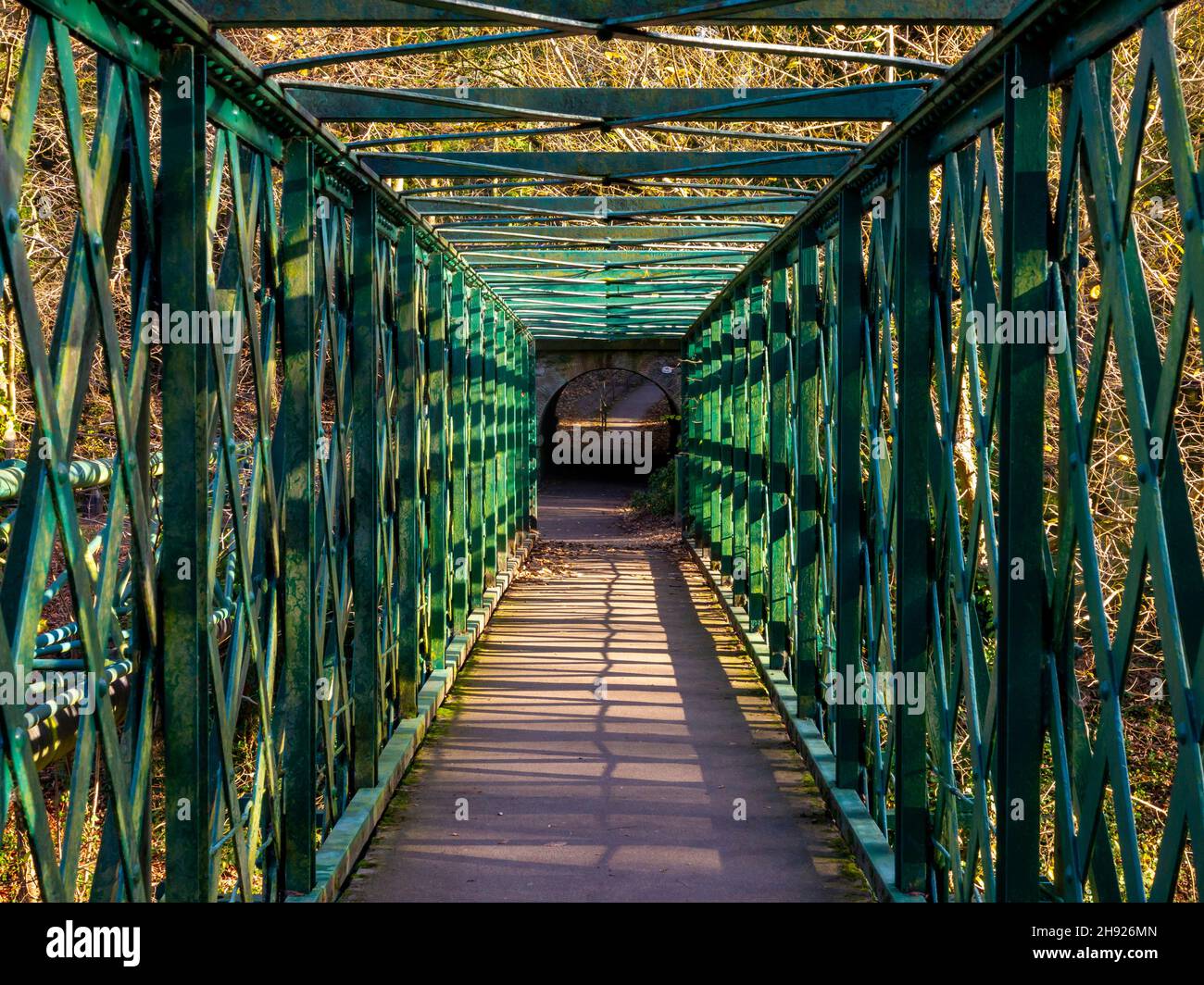 Metal footbridge over the River Derwent near Matlock Bath in the ...