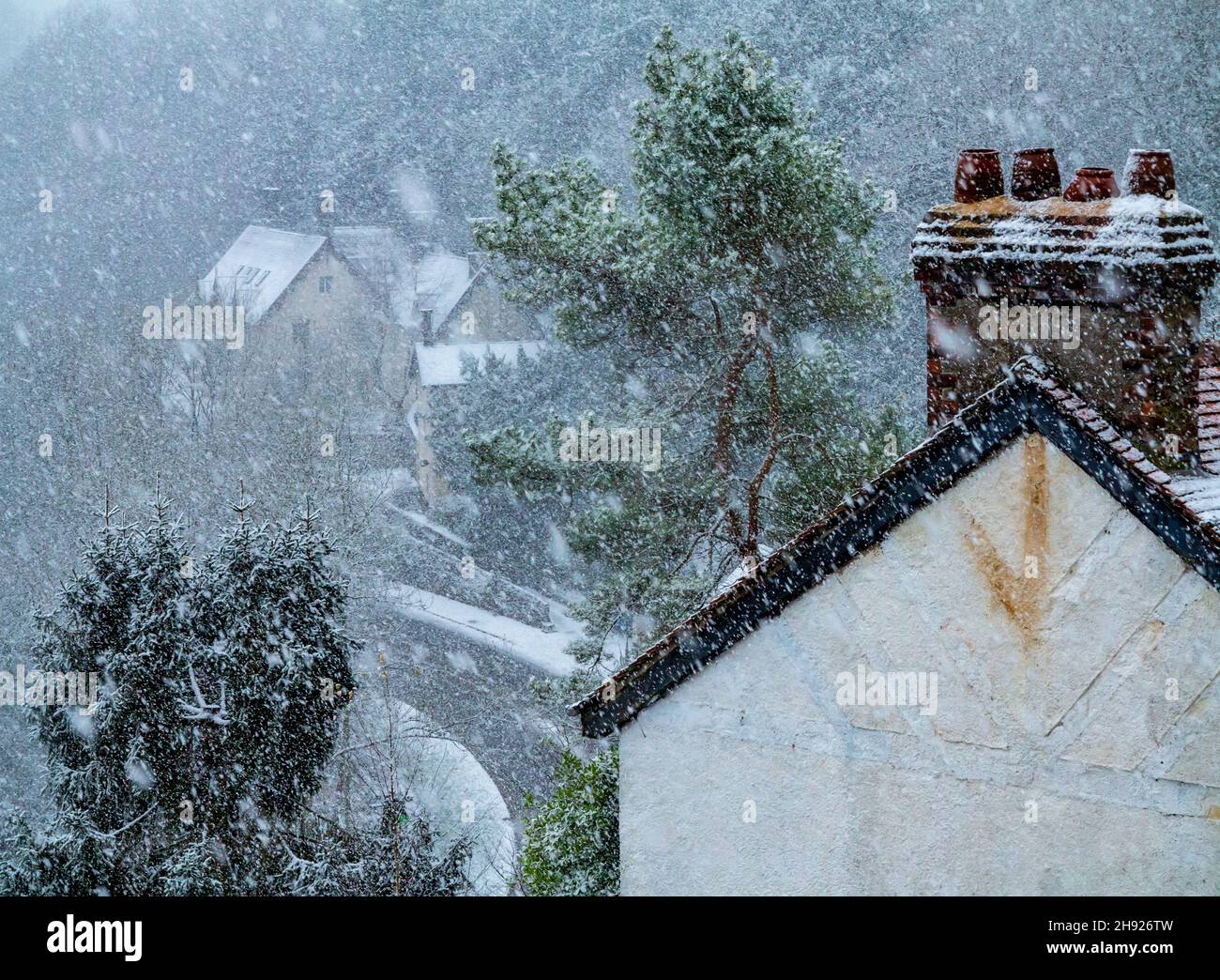Snow covered landscape with trees at Matlock Bath in the Derbyshire ...
