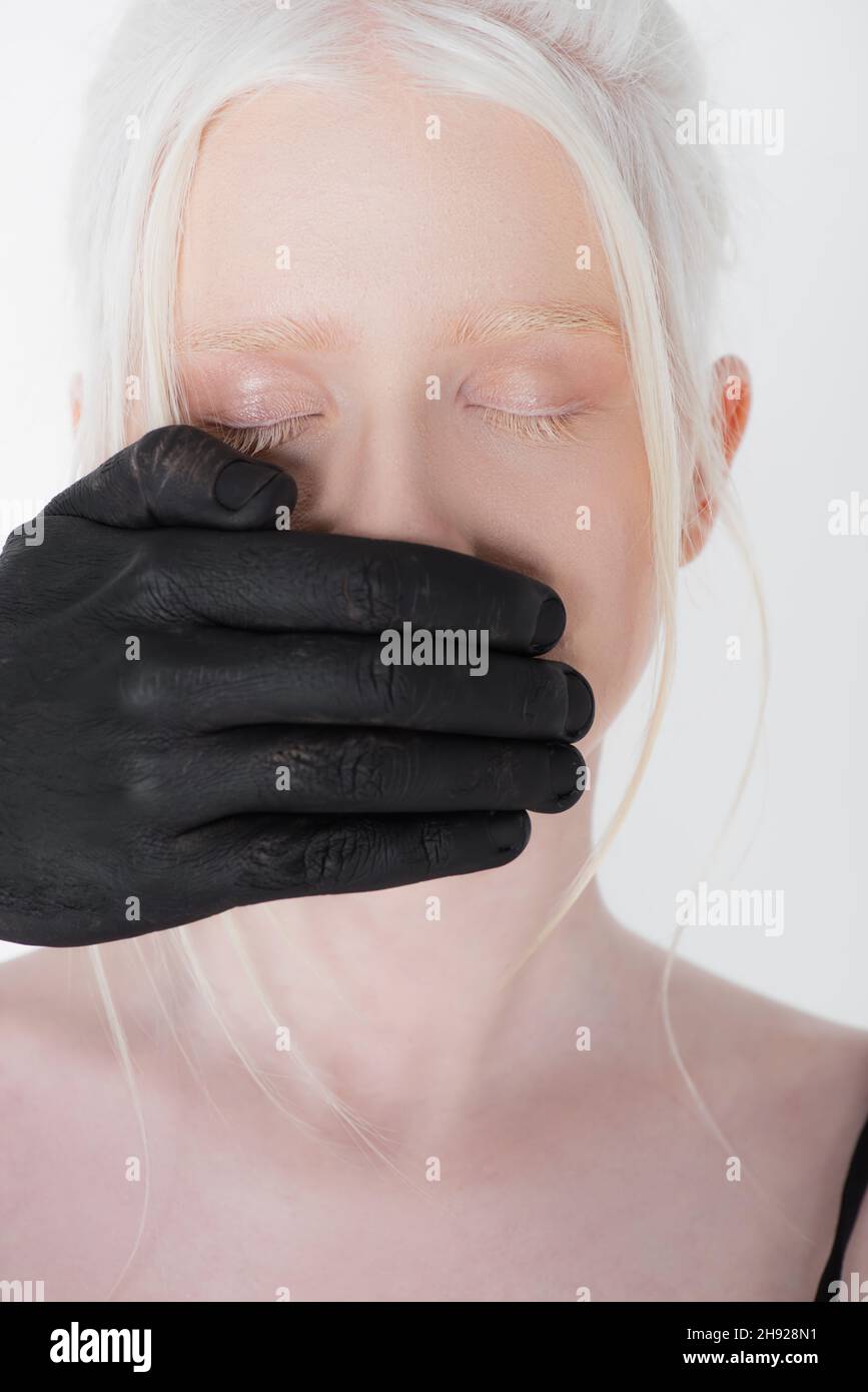 Hand covering eyes black and white hi-res stock photography and images ...
