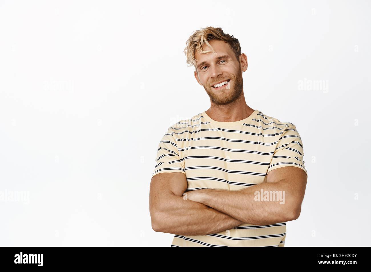 Image of handsome confident man cross arms on chest, professional ...