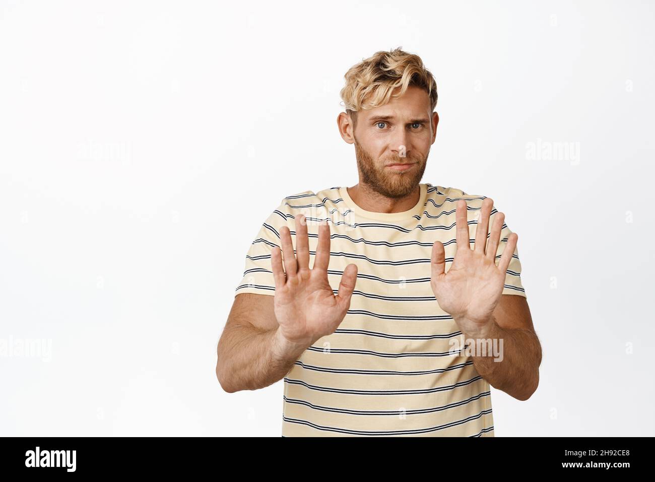 NO thanks. Portrait of man declining something with aversion, shaking ...