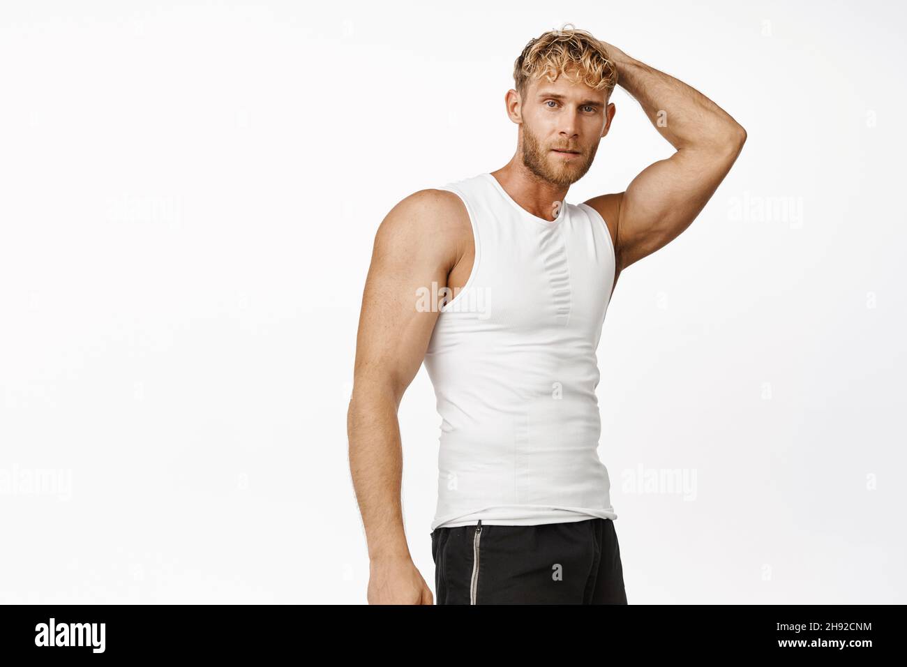 Fit guy showing biceps hi-res stock photography and images - Alamy