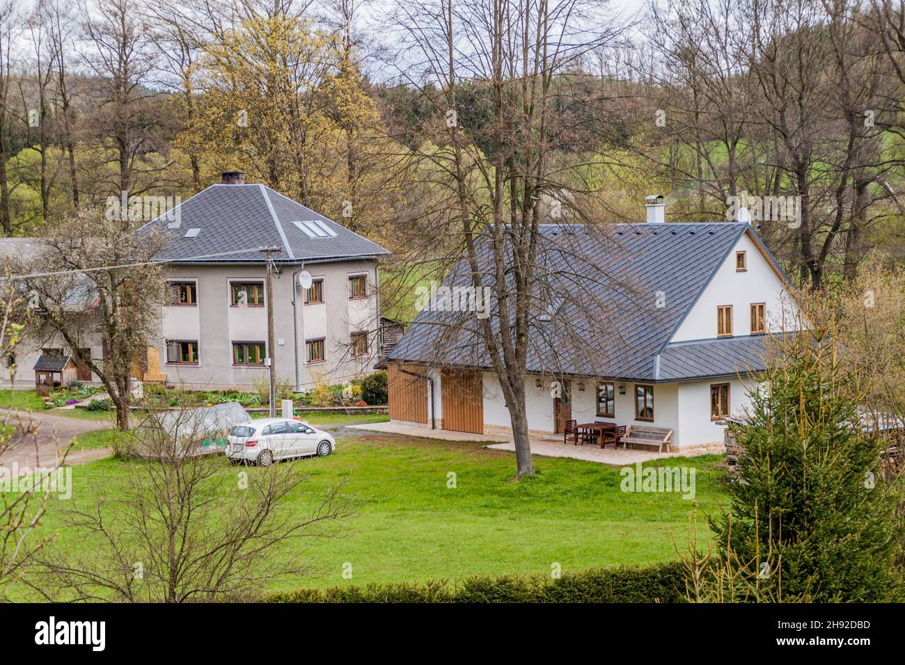 Modern and a traditional rural house in Letohrad, Czechia Stock Photo ...