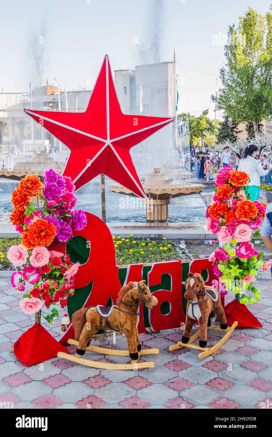 BISHKEK, KYRGYZSTAN - MAY 9, 2017: Red star and flowers for Victory Day ...