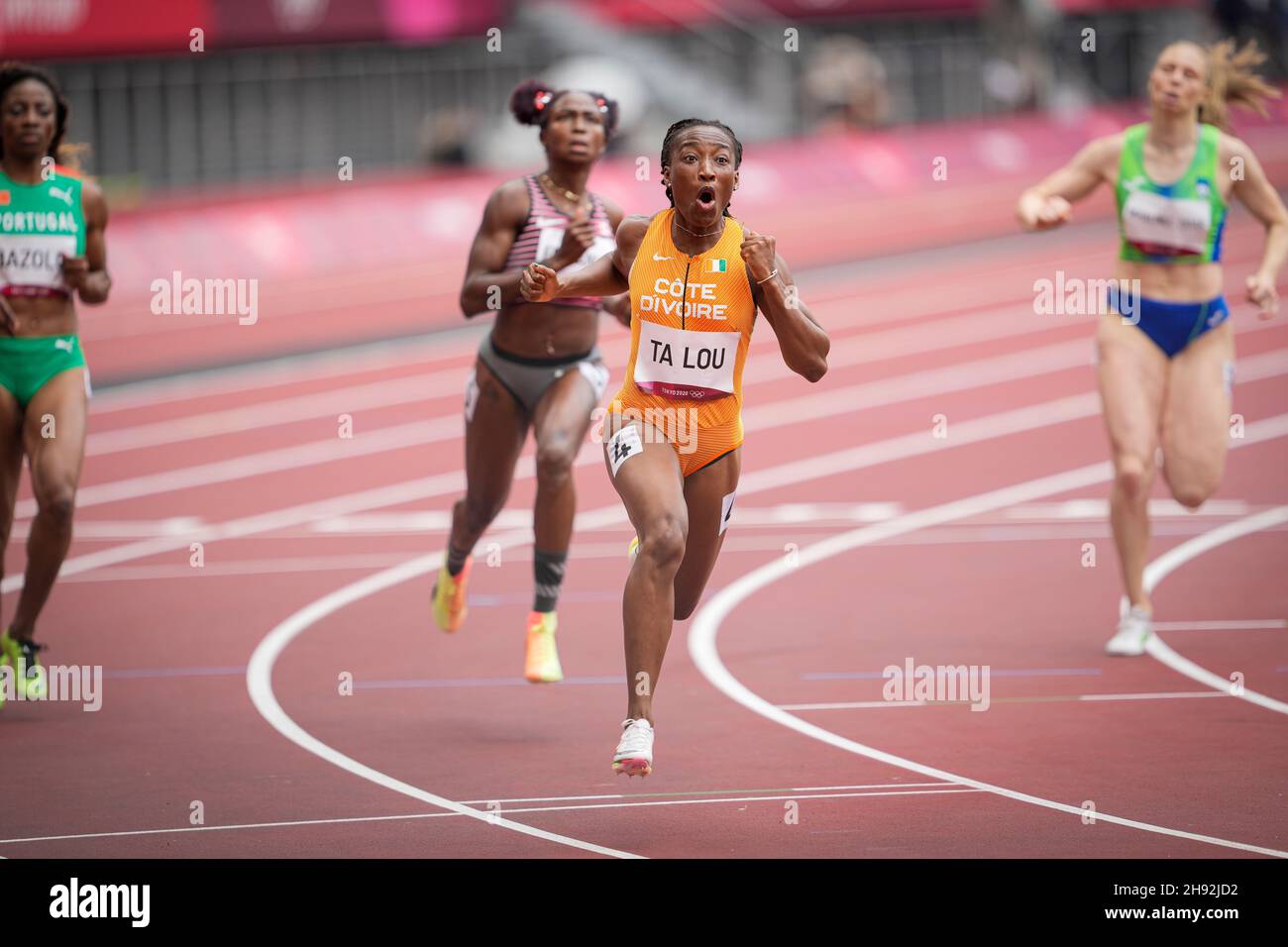 Marie-Josée Ta Lou competing in the 100 meters of the Tokyo 2020 ...