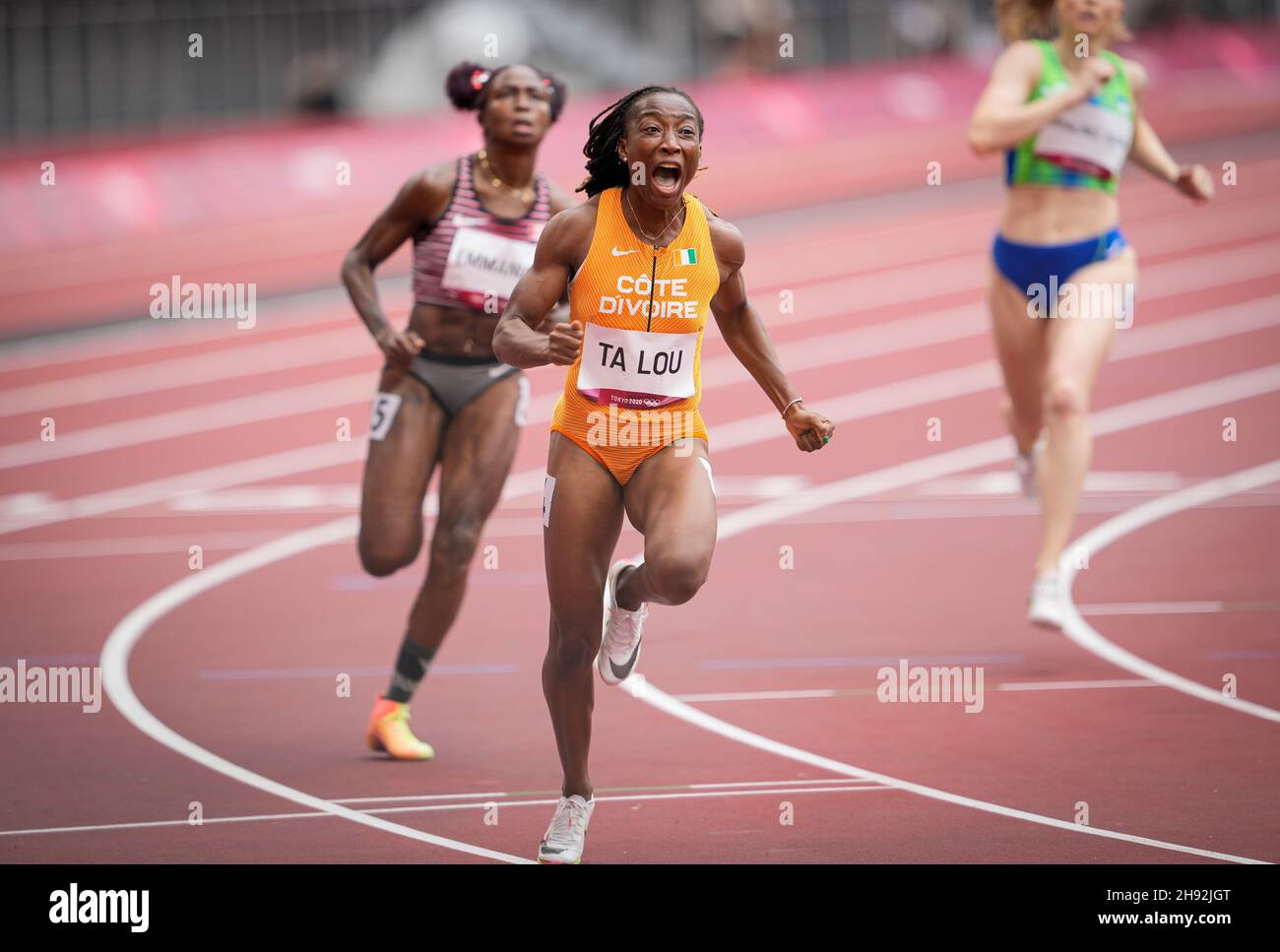 Marie-Josée Ta Lou competing in the 100 meters of the Tokyo 2020 ...