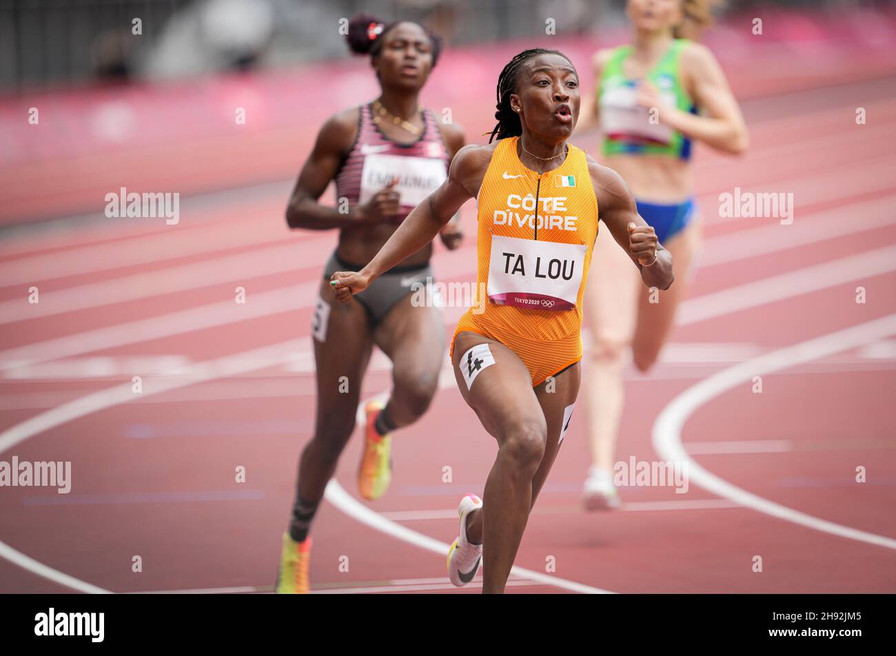 Marie-Josée Ta Lou competing in the 100 meters of the Tokyo 2020 ...