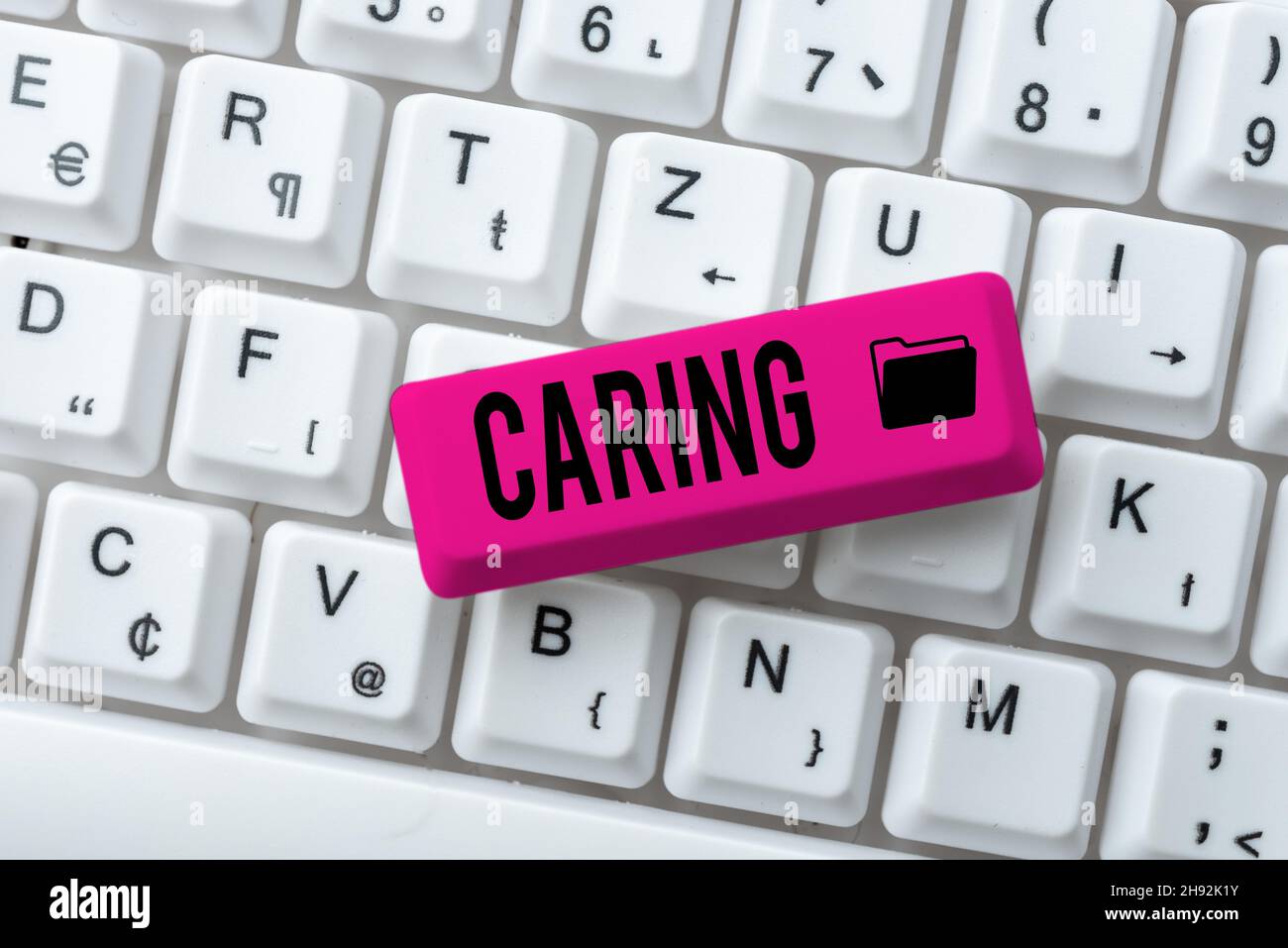 Writing displaying text Caring. Word Written on practice of looking ...