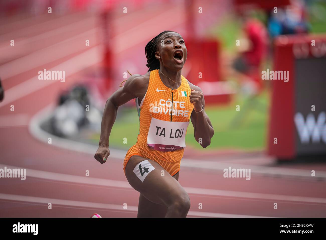 Marie-Josée Ta Lou competing in the 100 meters of the Tokyo 2020 ...