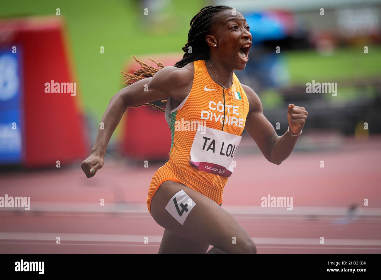 Marie-Josée Ta Lou competing in the 100 meters of the Tokyo 2020 ...