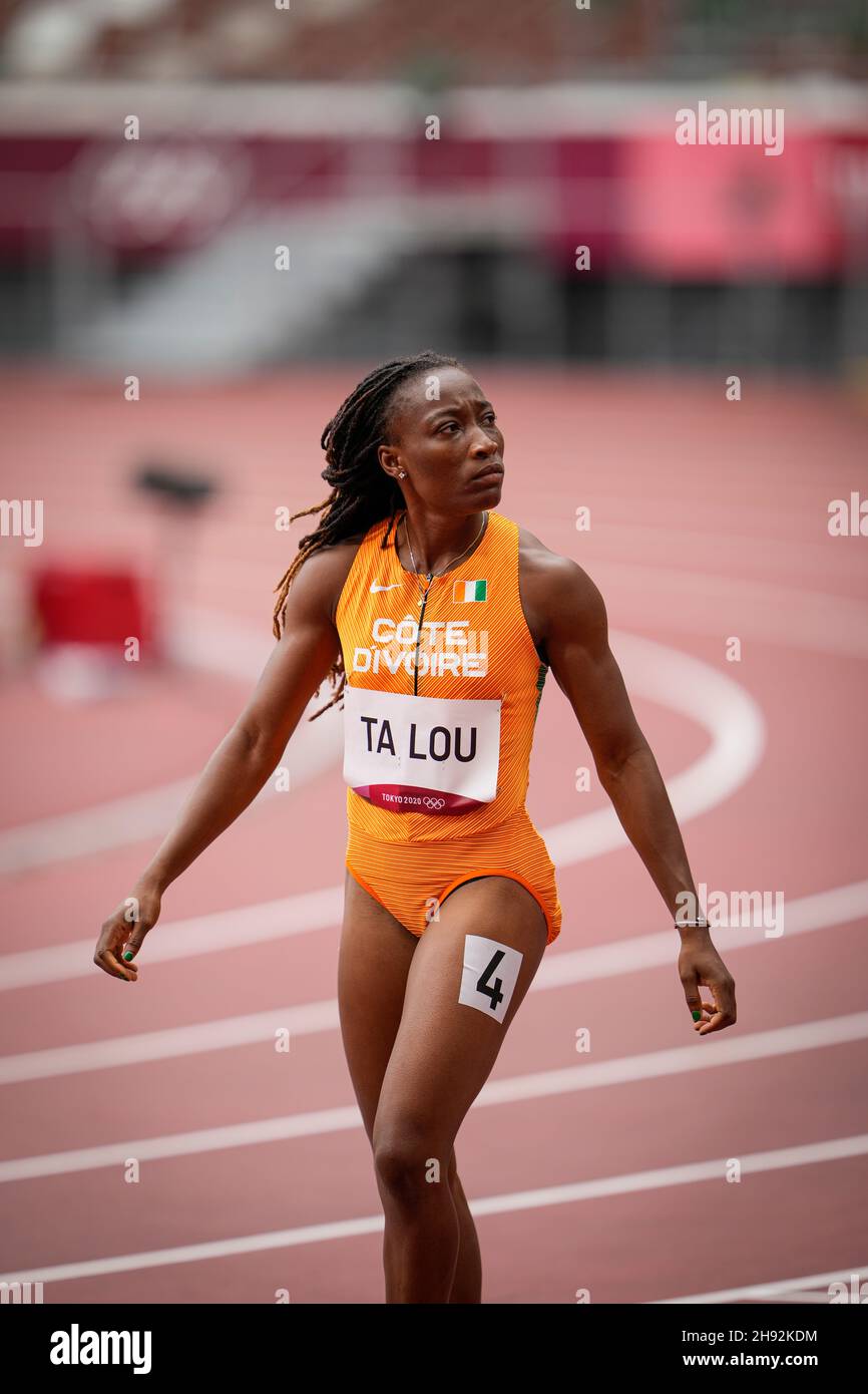 Marie-Josée Ta Lou competing in the 100 meters of the Tokyo 2020 ...