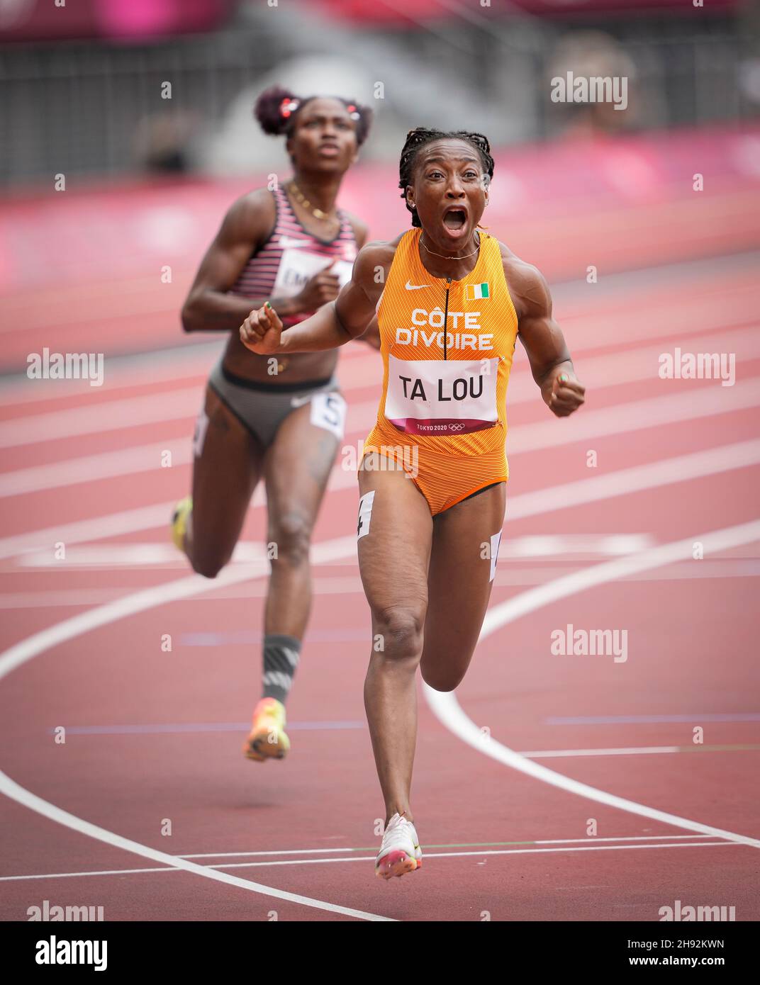Marie-Josée Ta Lou competing in the 100 meters of the Tokyo 2020 ...