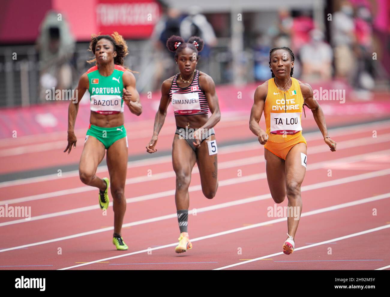 Marie-Josée Ta Lou competing in the 100 meters of the Tokyo 2020 ...