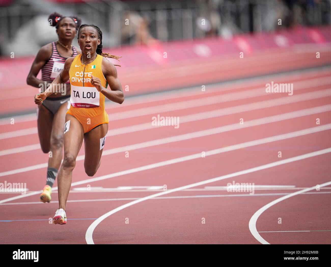 Marie-Josée Ta Lou competing in the 100 meters of the Tokyo 2020 ...