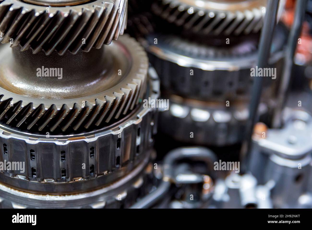 Planetary gearsets inside vehicle automatic transmission. Close up view ...