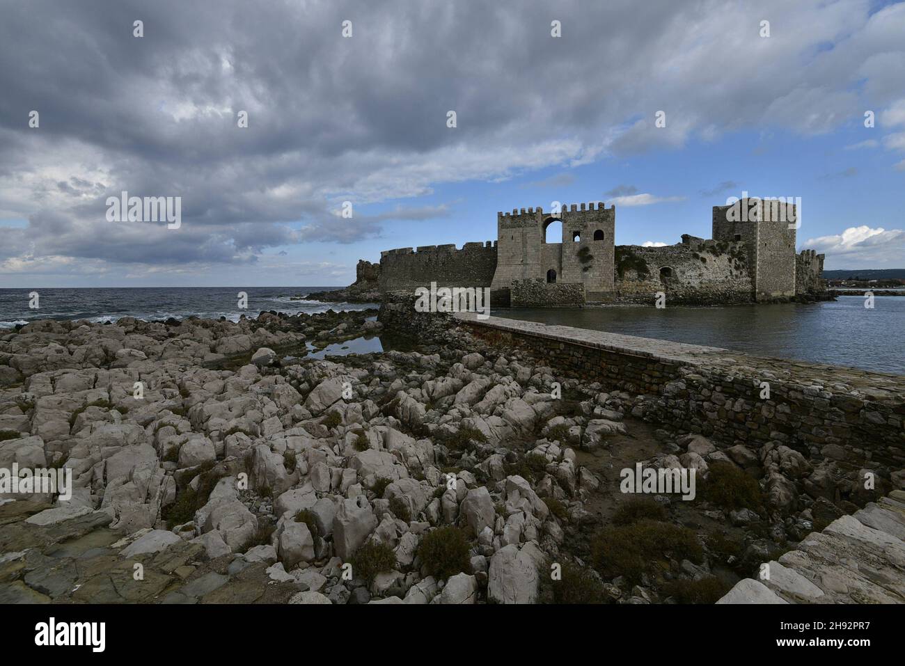 Seaside landscape with panoramic view of Methoni Castle a medieval ...