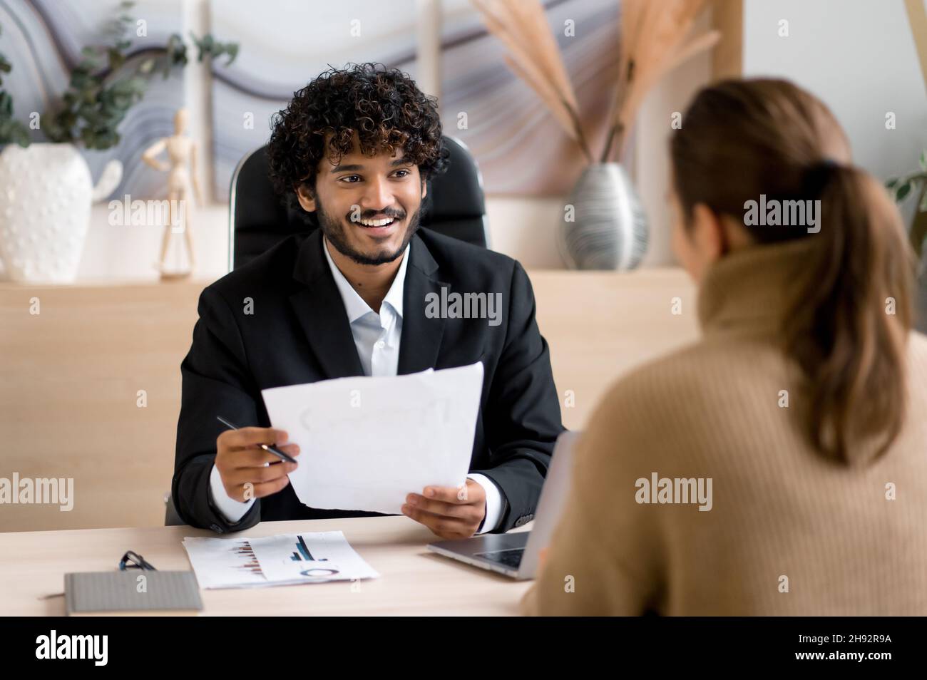 Confident successful Indian male HR manager, entrepreneur, conducts ...