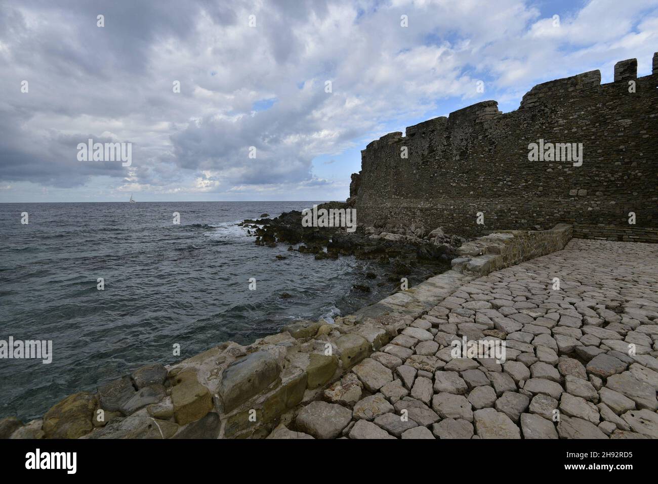 Seaside landscape with panoramic view of Methoni Castle a medieval ...